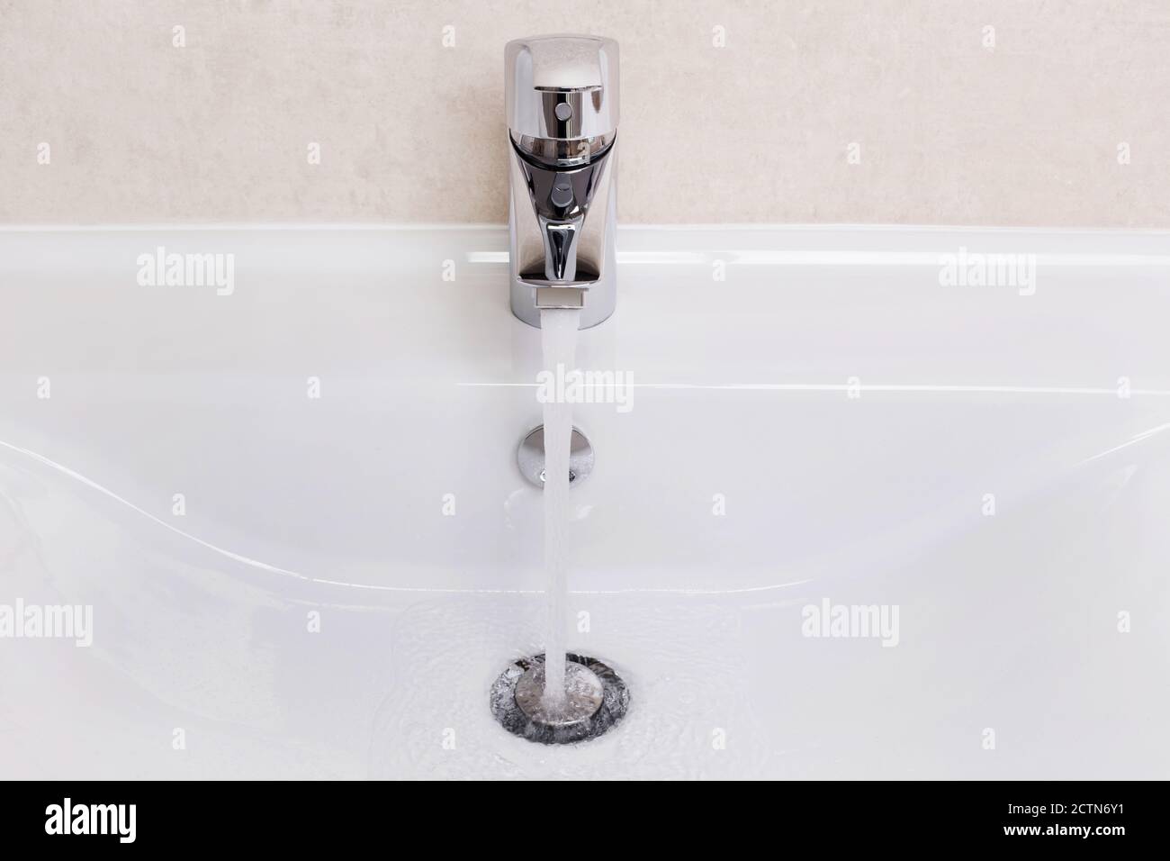 Running water faucet Stock Photo - Alamy