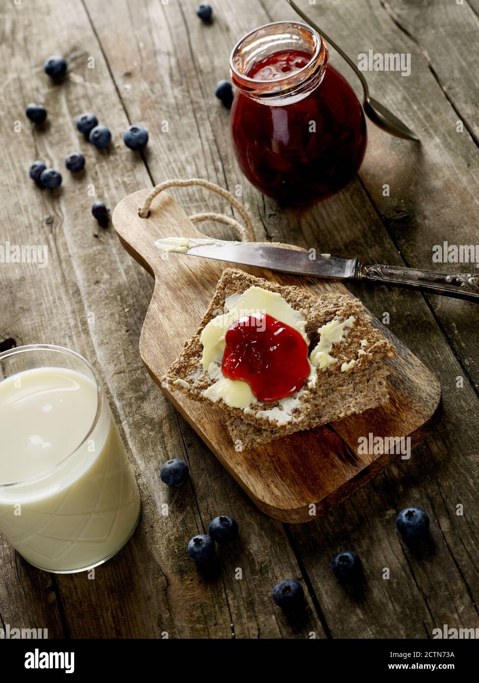 Bread, jam and milk Stock Photo - Alamy