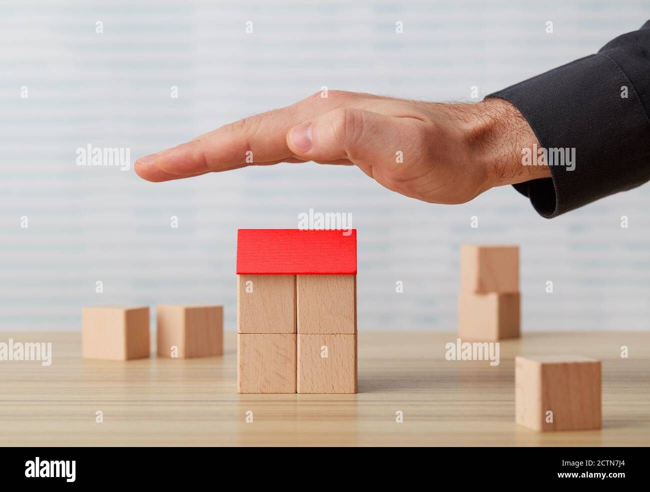 Wooden cubes on office desk Stock Photo - Alamy