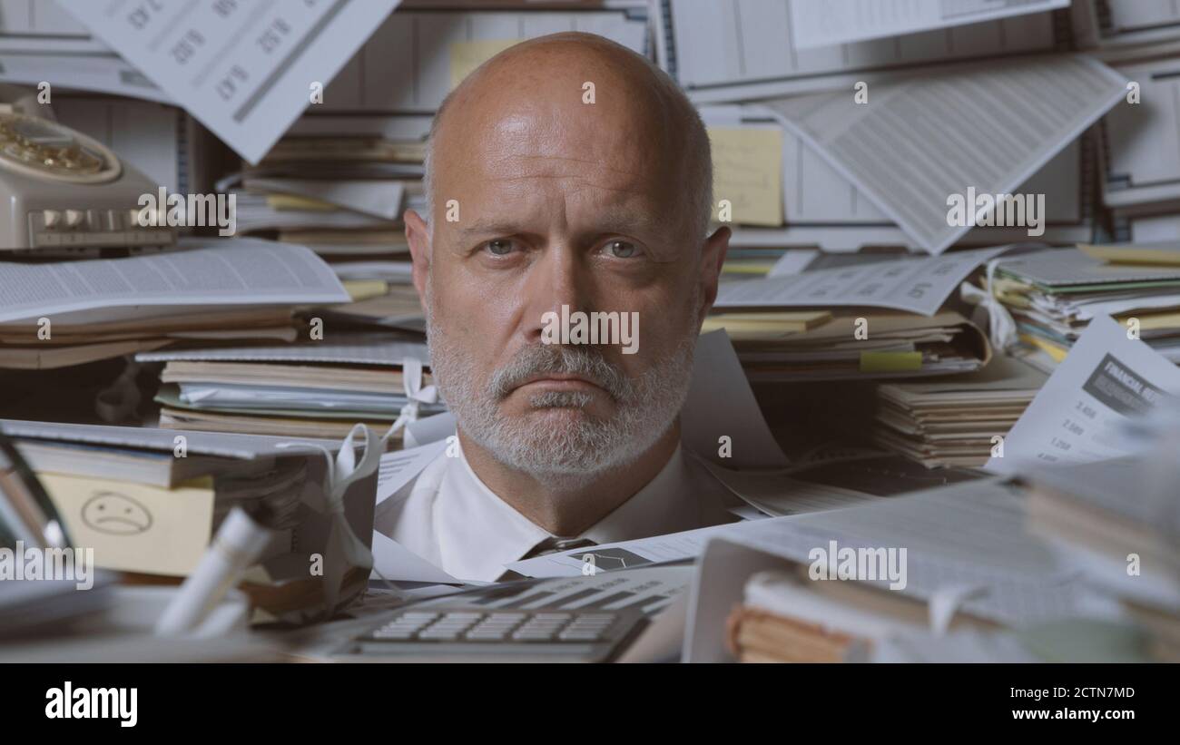 Drowning in paperwork hi-res stock photography and images - Alamy