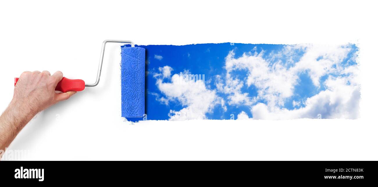 Hand with paintbrush painting the sky, isolated on white Stock Photo ...