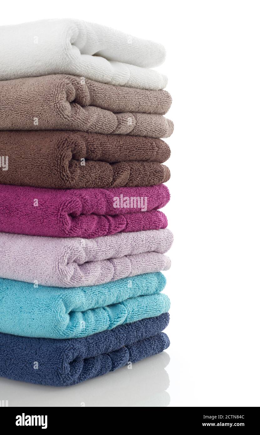 Clean multi-colored towels isolated on white Stock Photo - Alamy