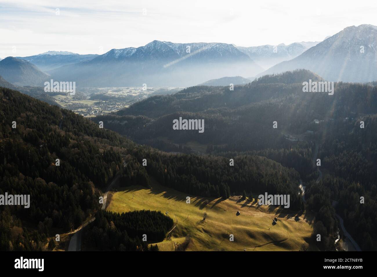 Spectacular aerial view of green valley with coniferous forest and ...