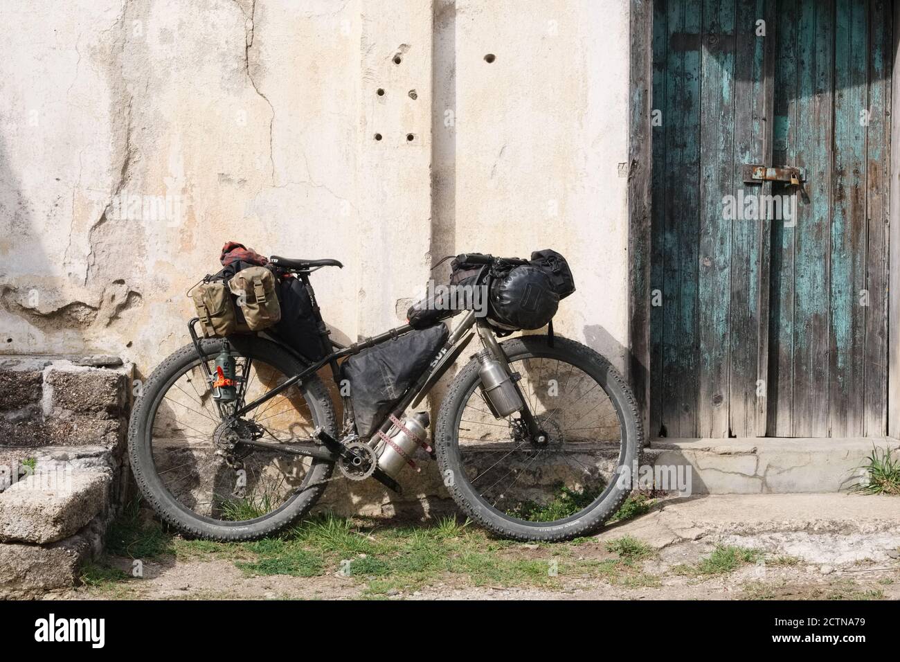 Fully loaded bikepacking bicycle on expedition Stock Photo - Alamy