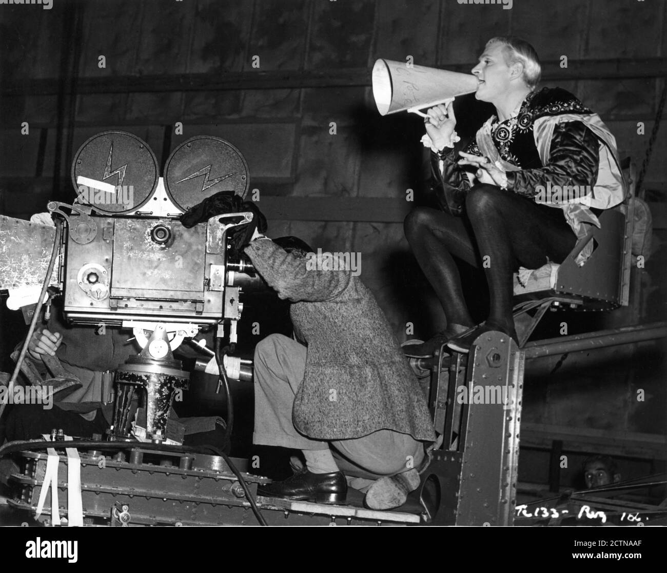 Cameraman RAY STURGESS and LAURENCE OLIVIER in costume holding ...