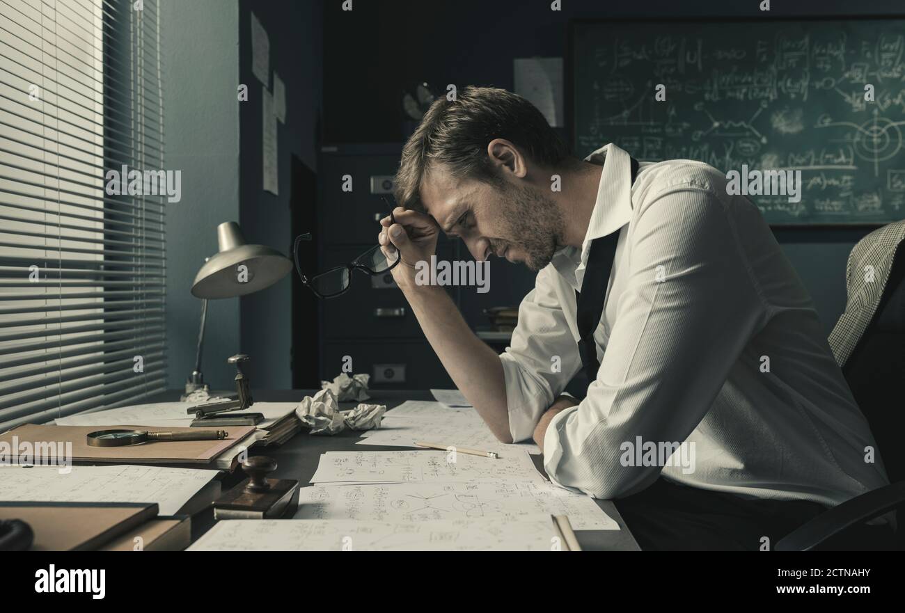 Confused man papers hi-res stock photography and images - Alamy