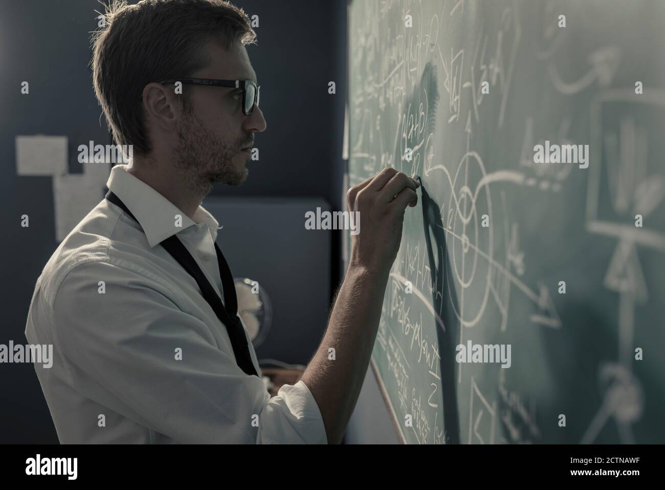 Solving math problem blackboard hi-res stock photography and images - Alamy
