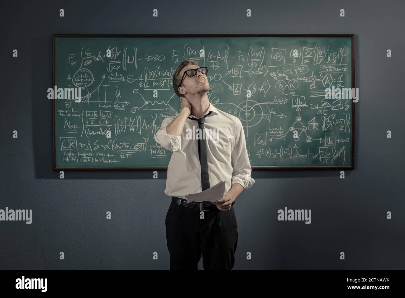 Confused student blackboard math hi-res stock photography and images ...