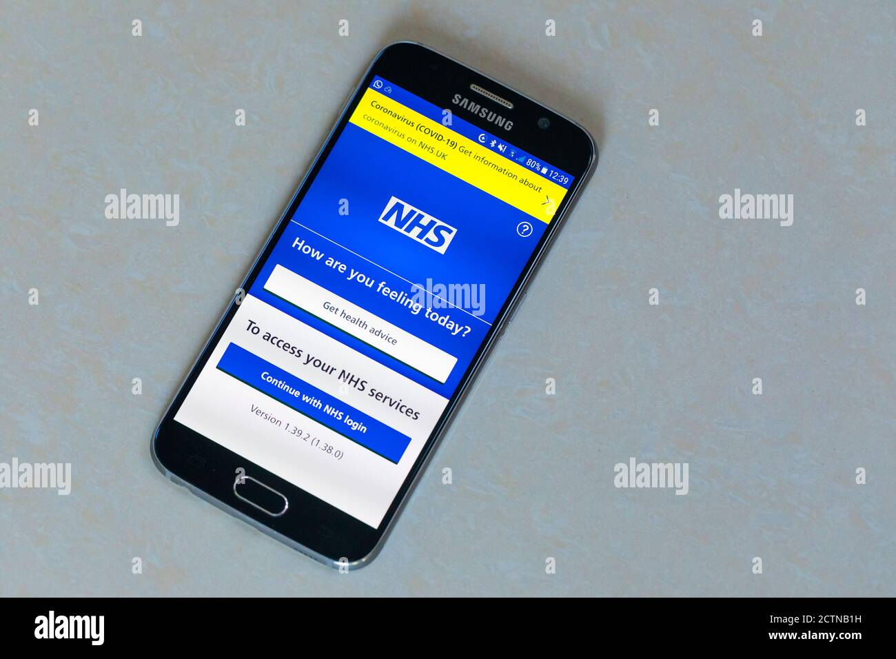 The NHS Track and Trace app home screen seen on the screen of a Samsung ...