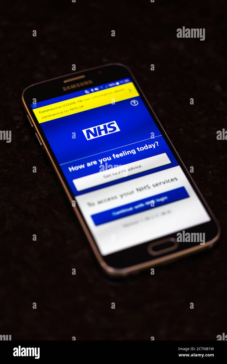The NHS Track and Trace app home screen seen on the screen of a Samsung ...