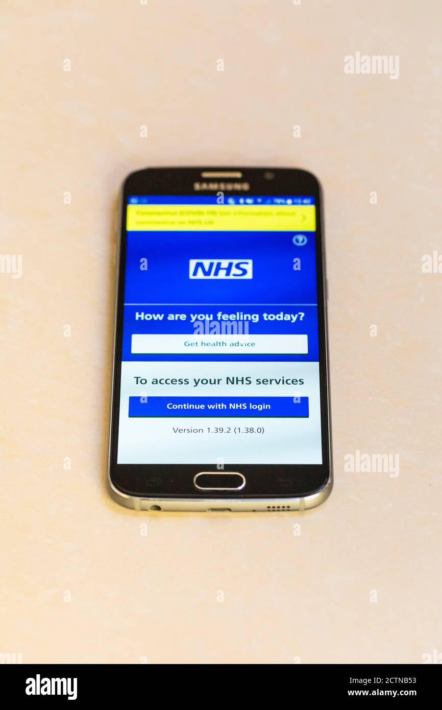 The NHS Track and Trace app home screen seen on the screen of a Samsung ...