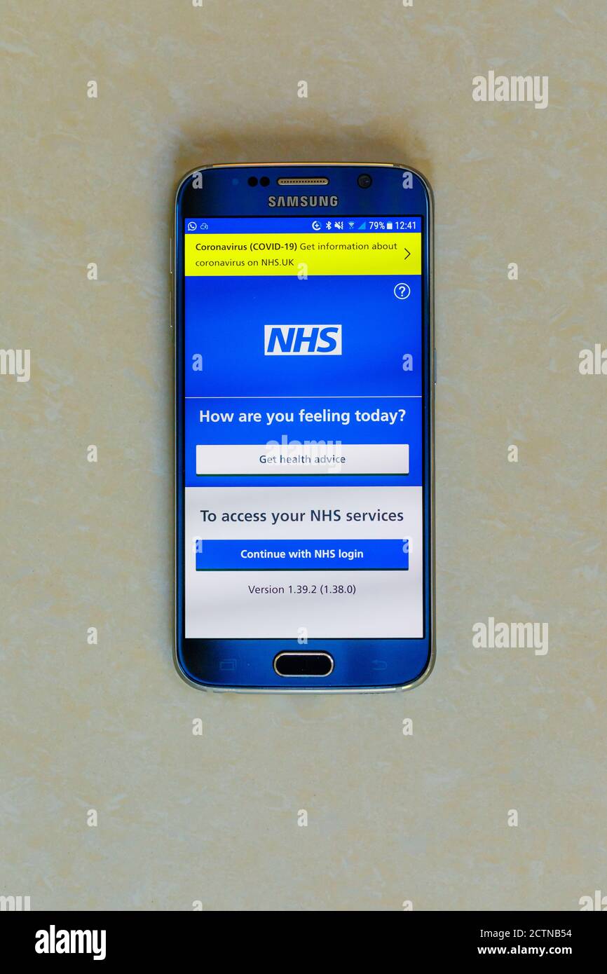 The NHS Track and Trace app home screen seen on the screen of a Samsung ...