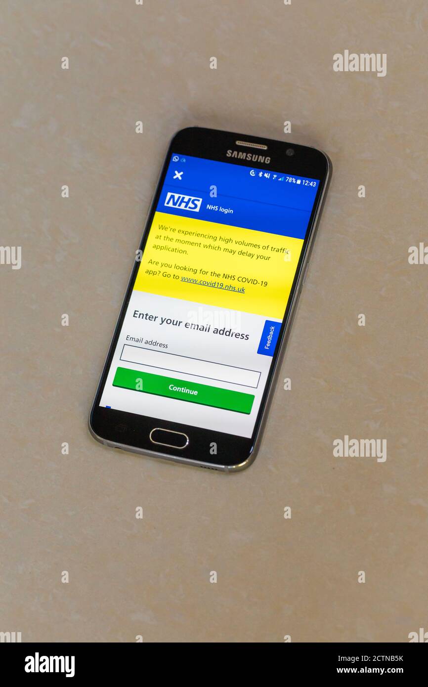The NHS Track and Trace app on the screen of an Android mobile phone ...