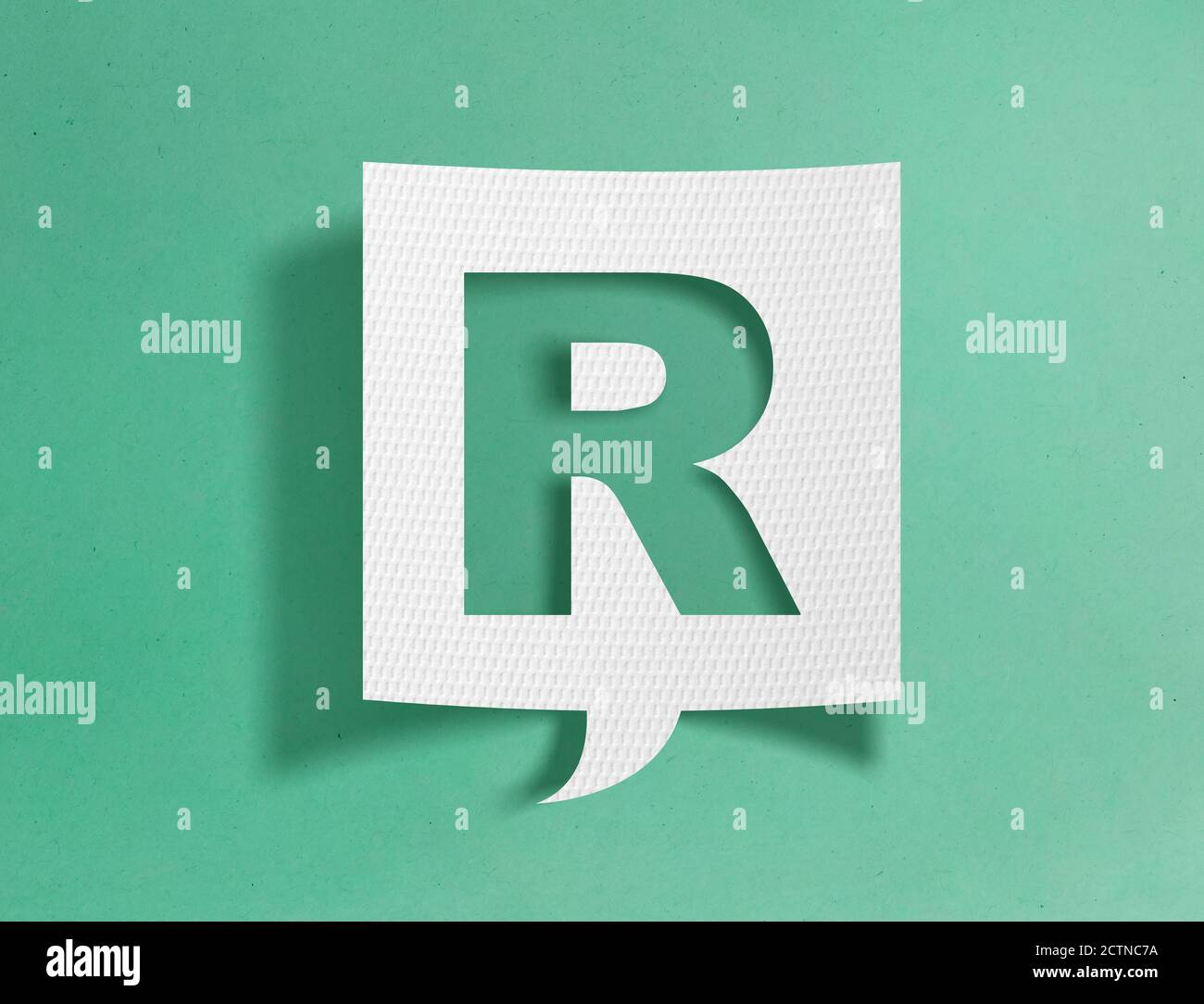 Speech bubble with letter R on green background Stock Photo - Alamy