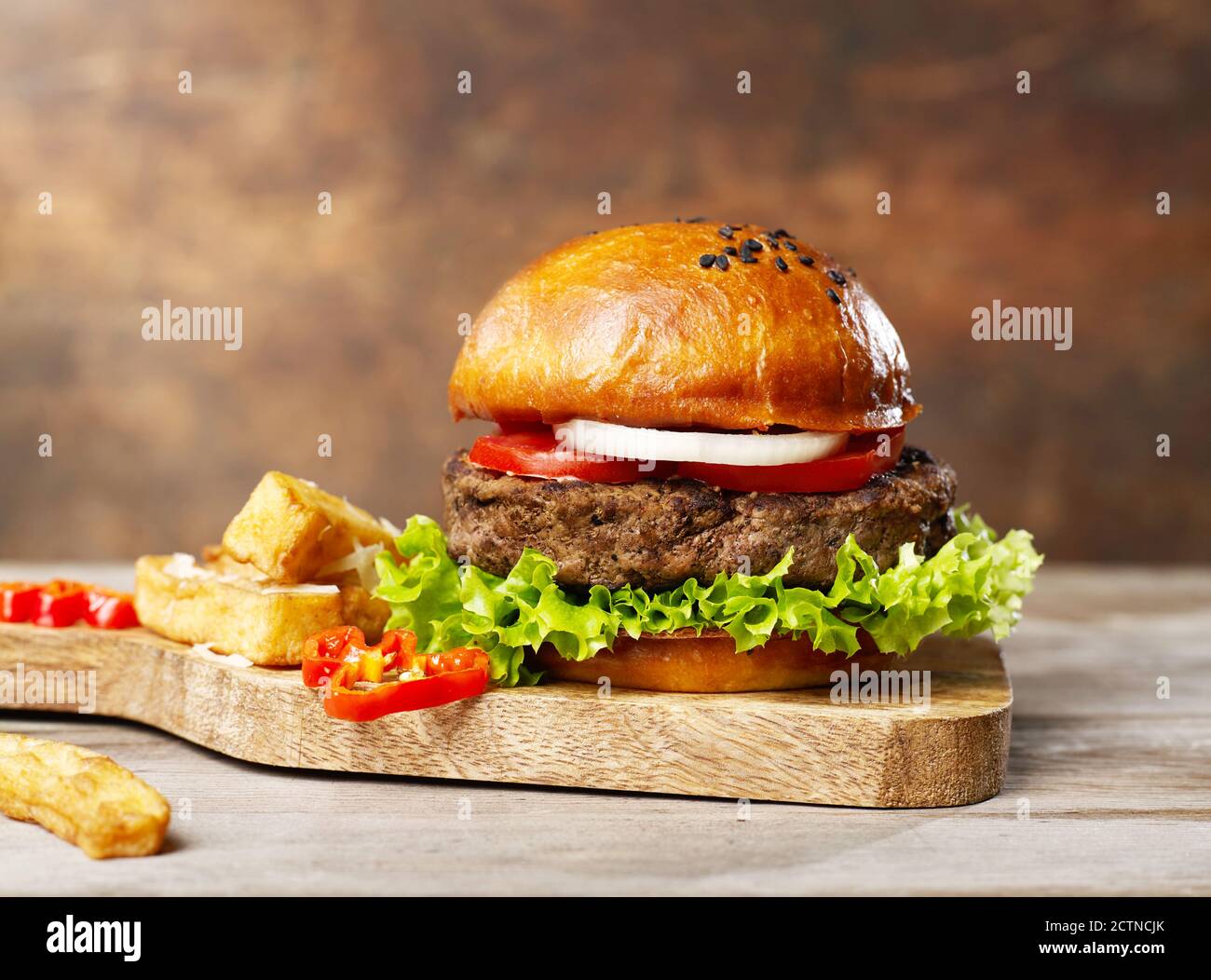 Spicy burger with red pepper Stock Photo - Alamy