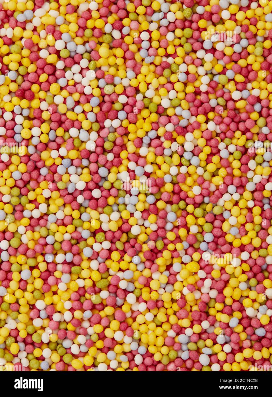 Colored sprinkles background Stock Photo - Alamy