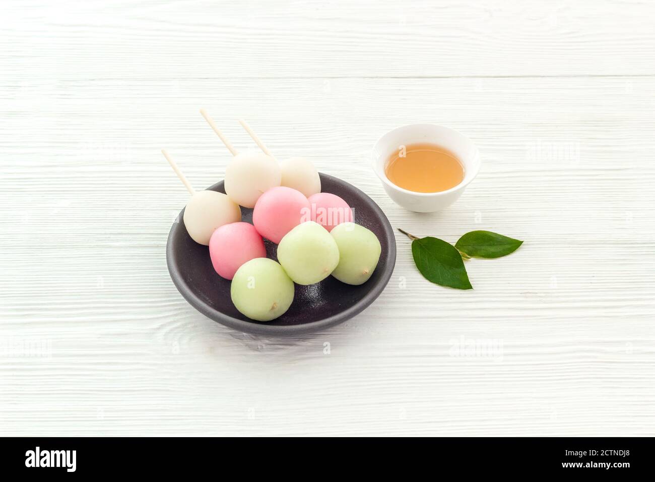 Asian cooking background - traditional sweets Dango, dumpling rice cake ...