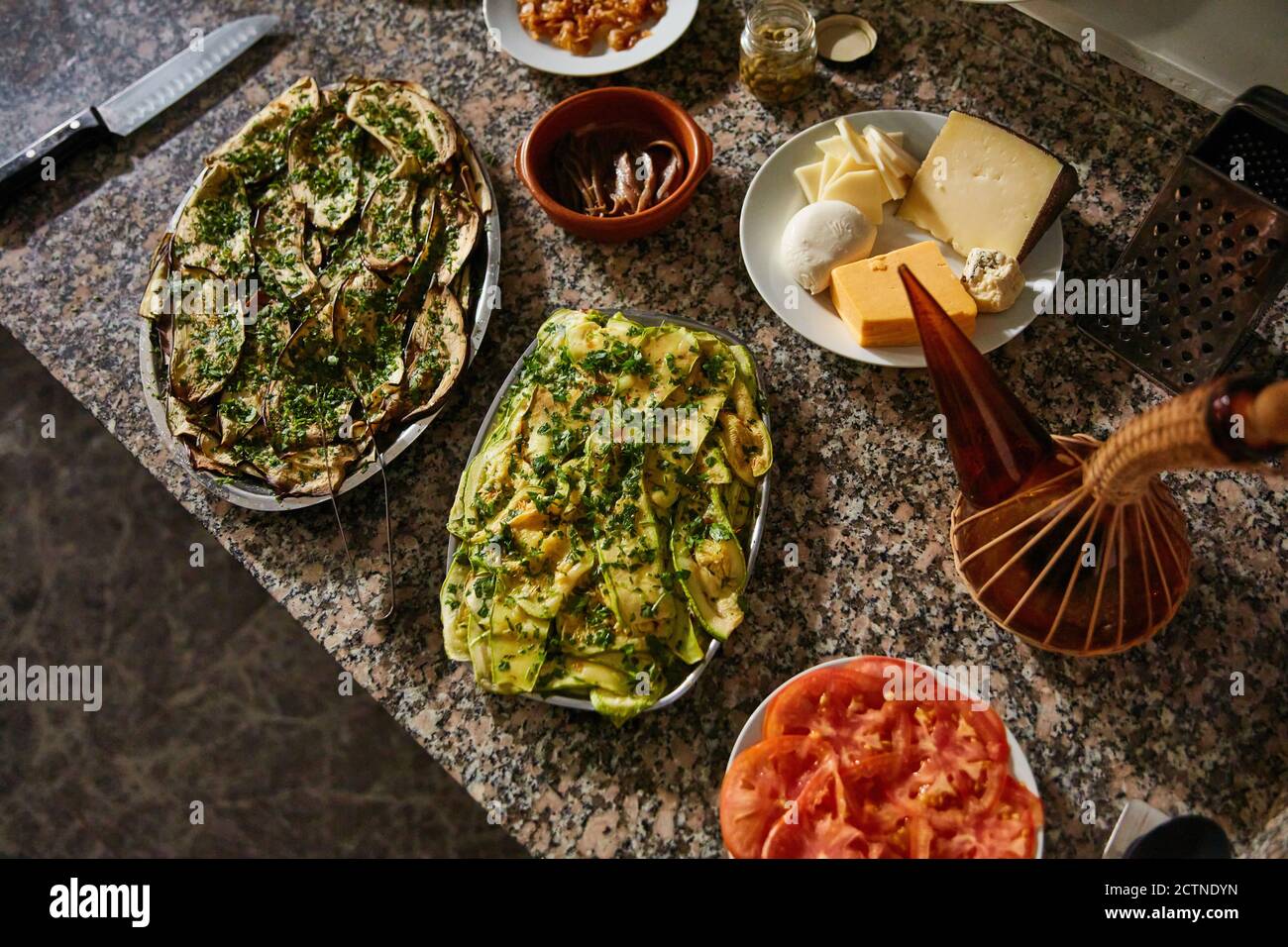 Top view of various fresh ingredients for pizza making on marble table ...