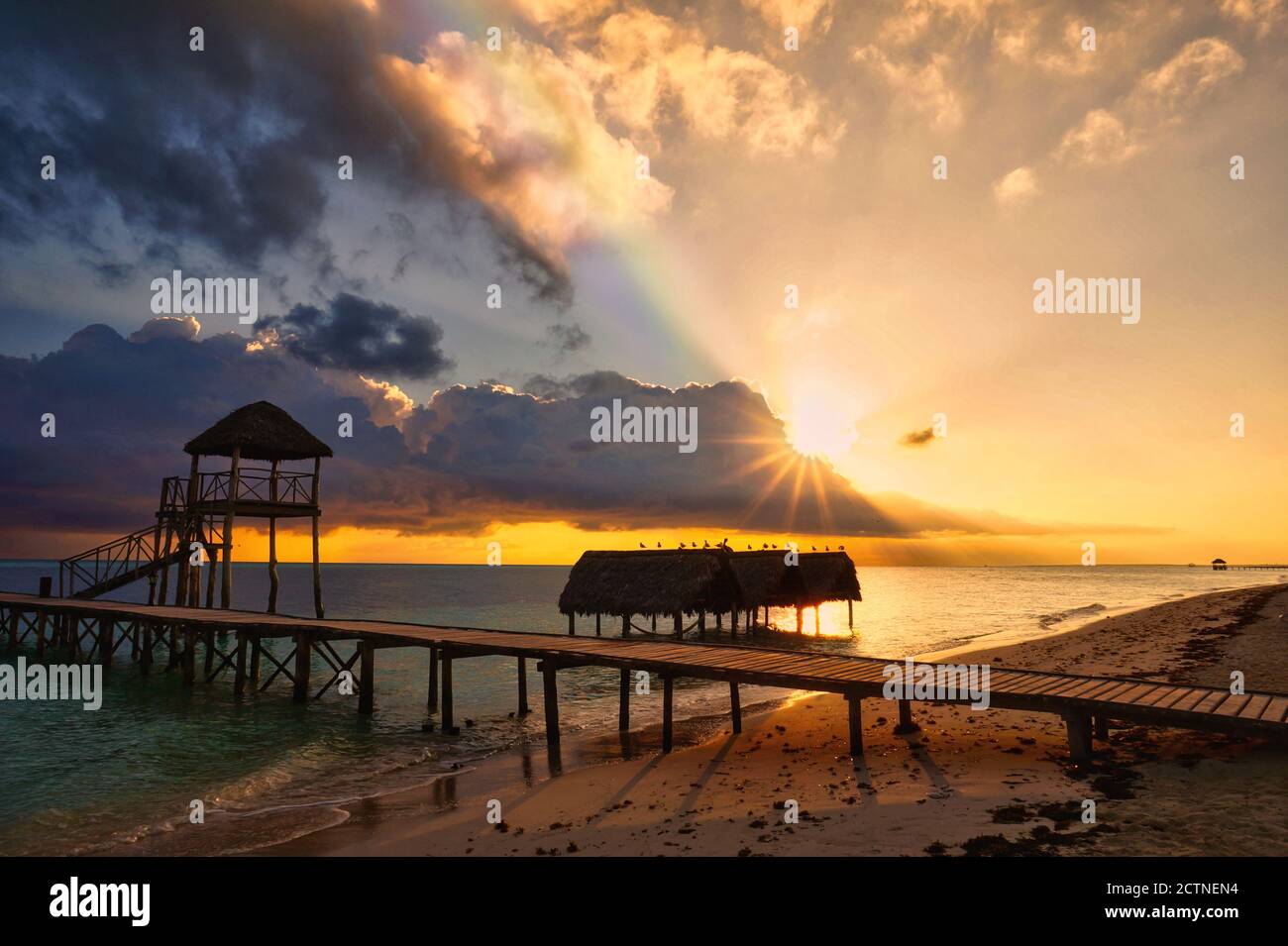 Sunrise at a tropical cuban beach Stock Photo - Alamy