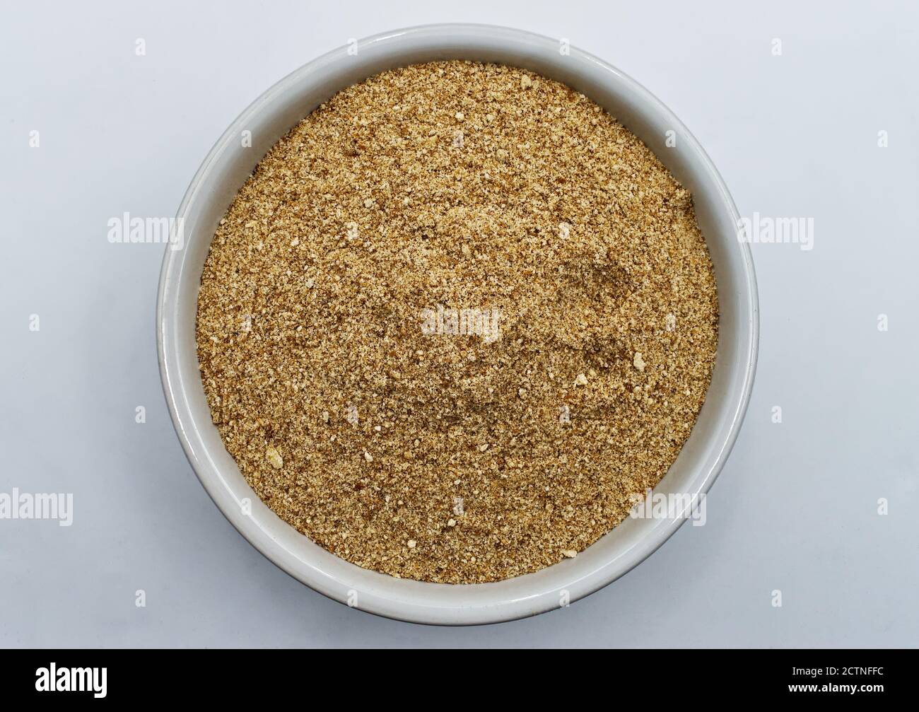 Bread crumbs in a bowl isolated on white background Stock Photo - Alamy