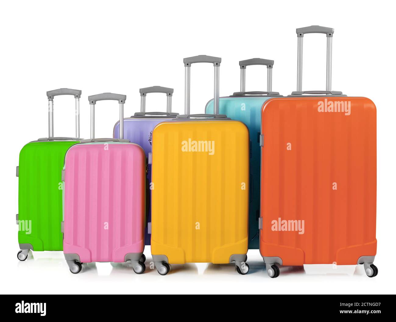 Multi-colored suitcases isolated on white Stock Photo - Alamy