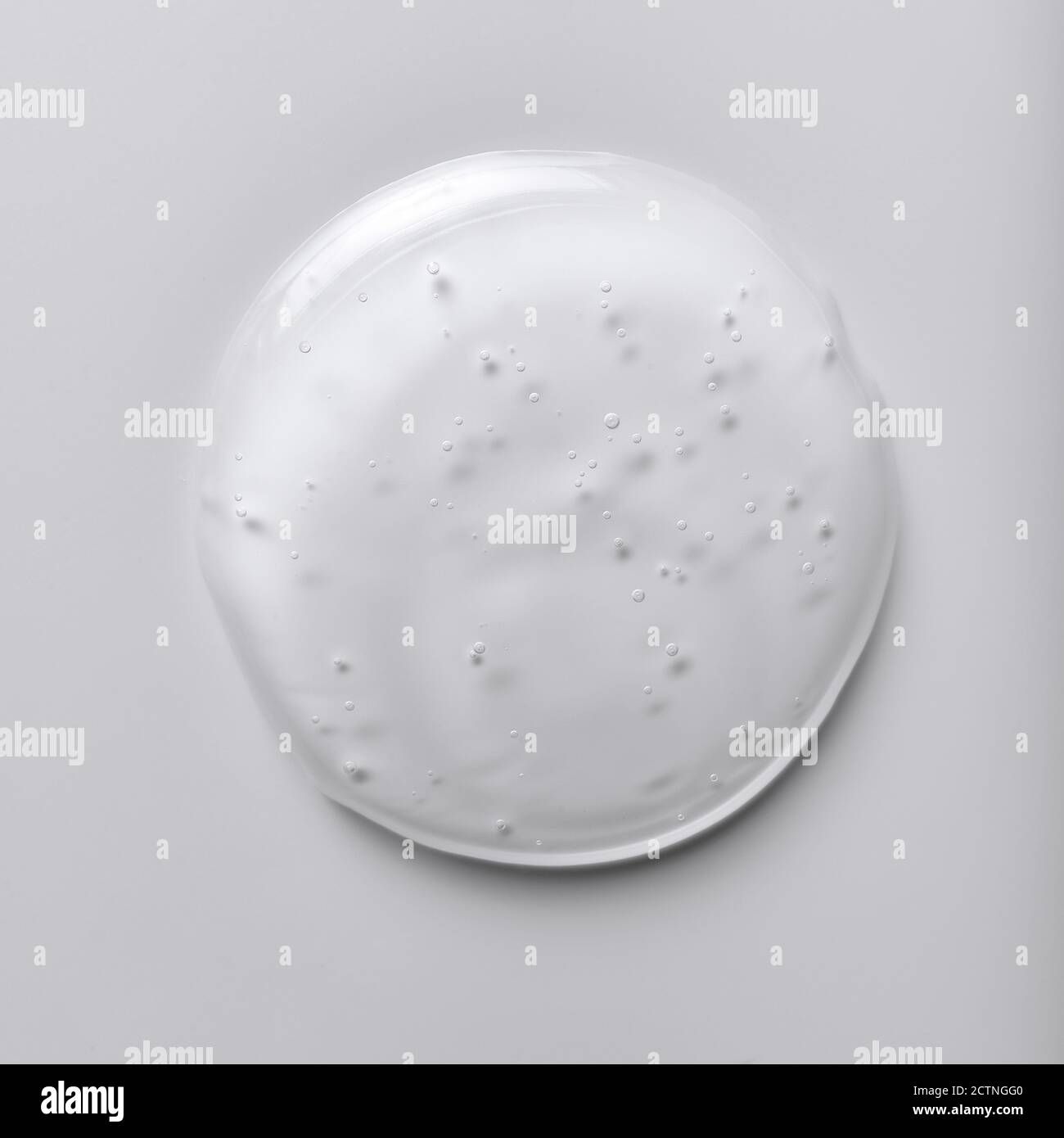 Single blob of transparent glycerin or gel. Glossy texture with tiny ...