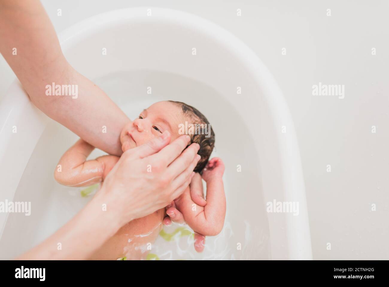 Woman wash face basin hi-res stock photography and images - Alamy