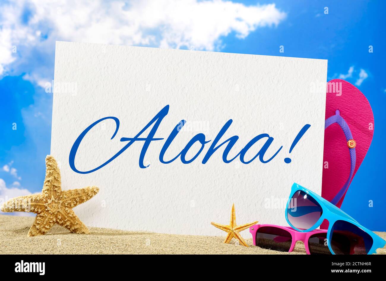 Aloha banner on the beach Stock Photo - Alamy