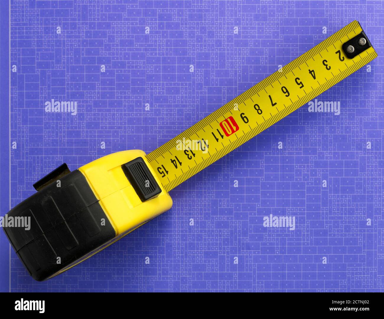 Tape measure on blueprints Stock Photo - Alamy