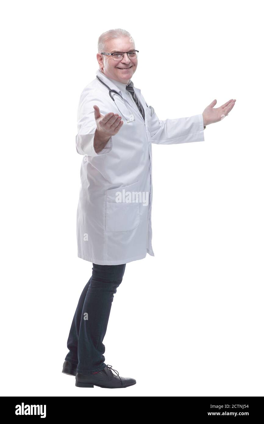 side view. friendly doctor standing near the white screen Stock Photo ...