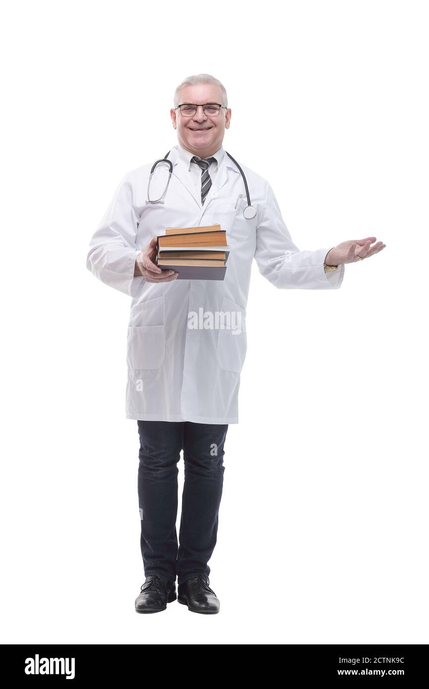 in full growth. a successful doctor with a stack of books Stock Photo ...