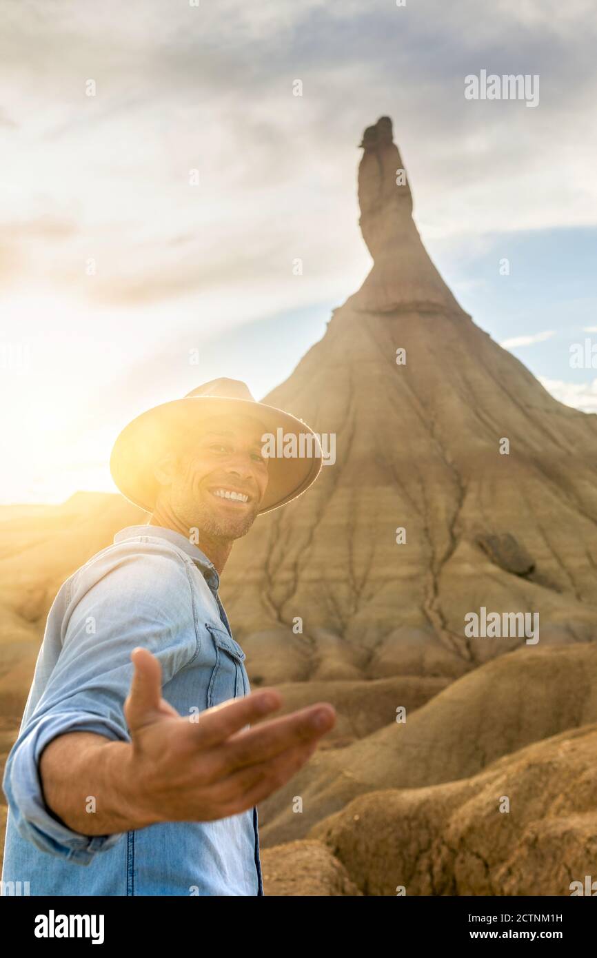 Hand reaching out side view hi-res stock photography and images - Alamy