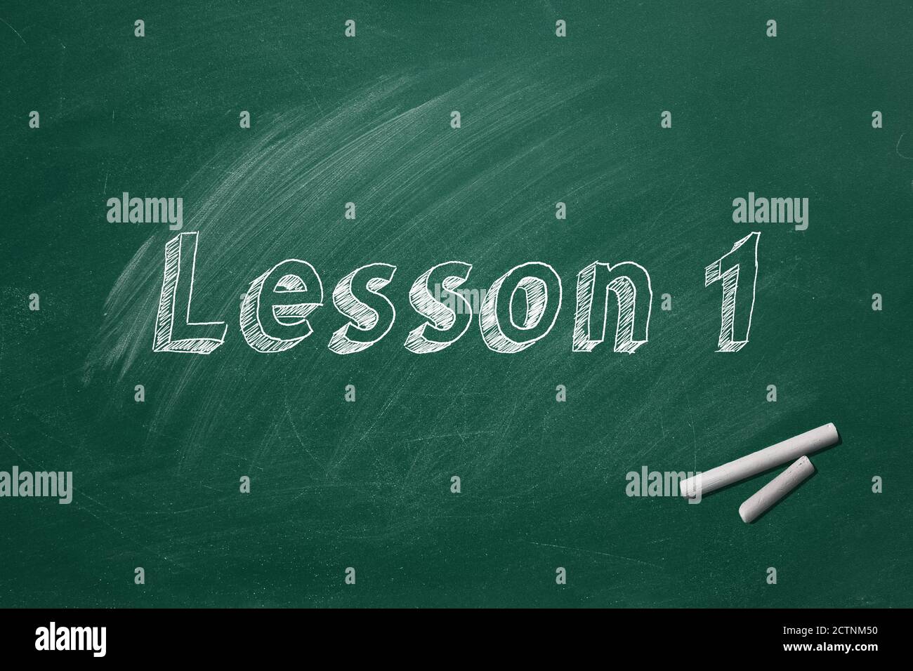 Lettering Lesson 1 on green chalkboard. Part 1 of 10 Stock Photo - Alamy