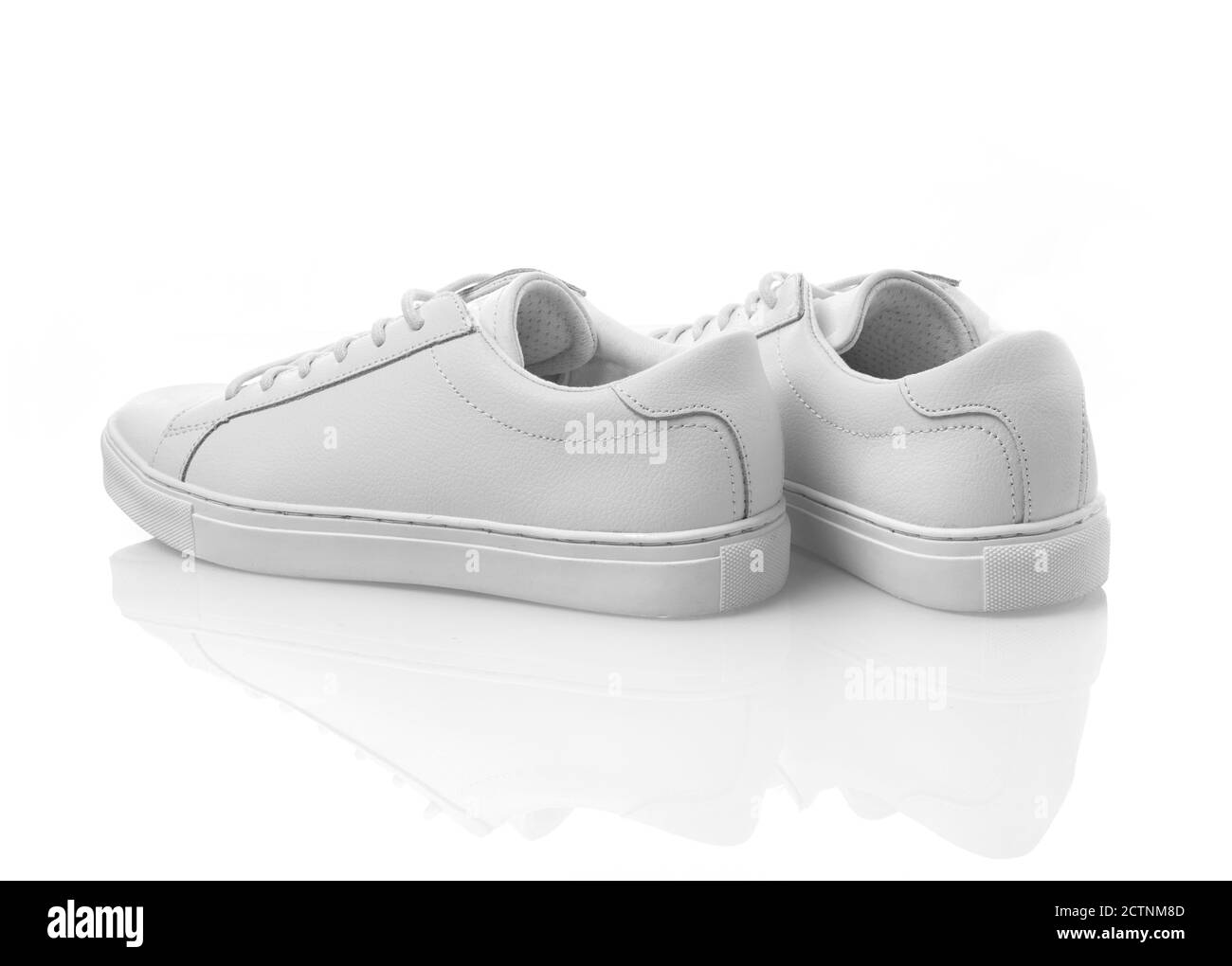 White shoes isolated on white Stock Photo - Alamy