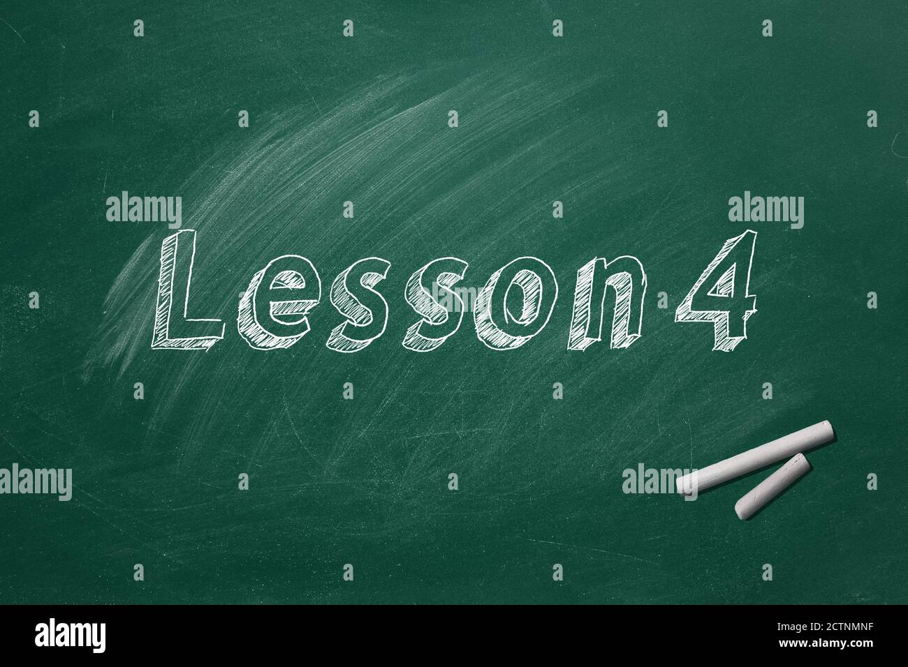 Lettering Lesson 4 on green chalkboard. Part 4 of 10 Stock Photo - Alamy