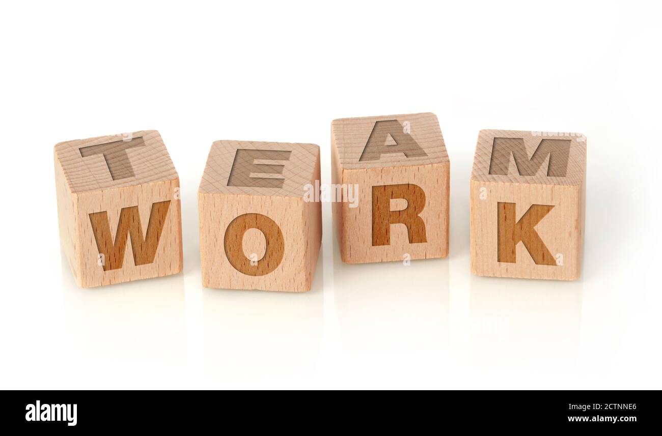 Team work wooden cubes, white background Stock Photo - Alamy