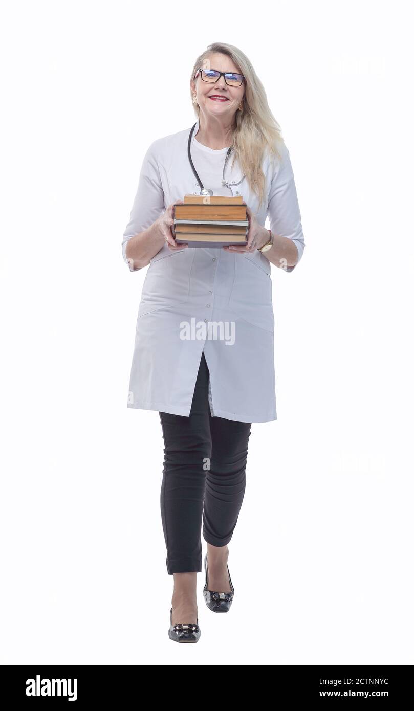in full growth. a female doctor with a stack of books pointing at you ...