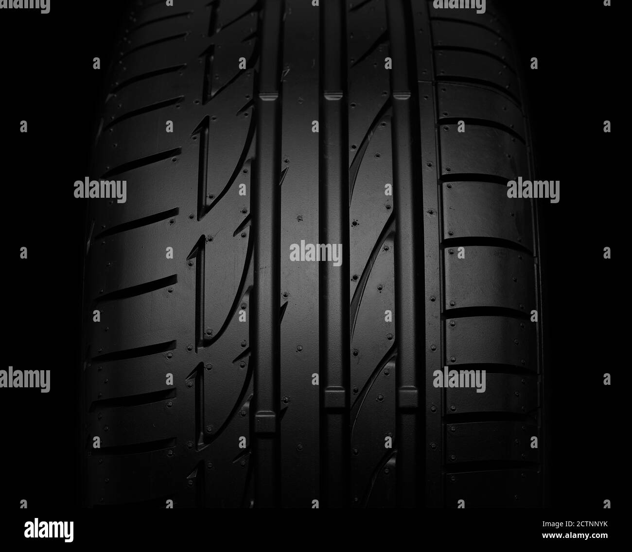 Car tire detail, isolated on black Stock Photo - Alamy