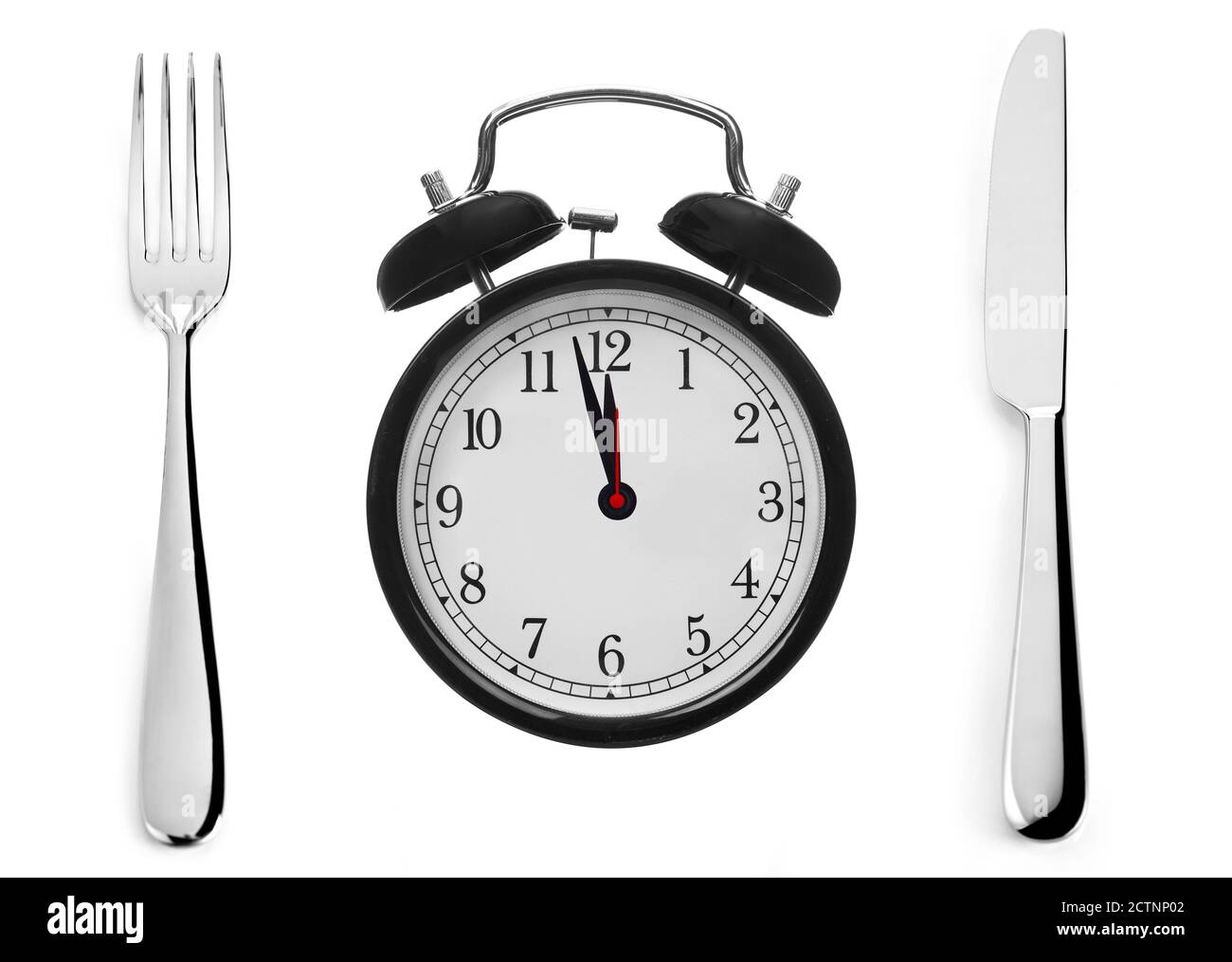 Fork, knife and clock Stock Photo - Alamy