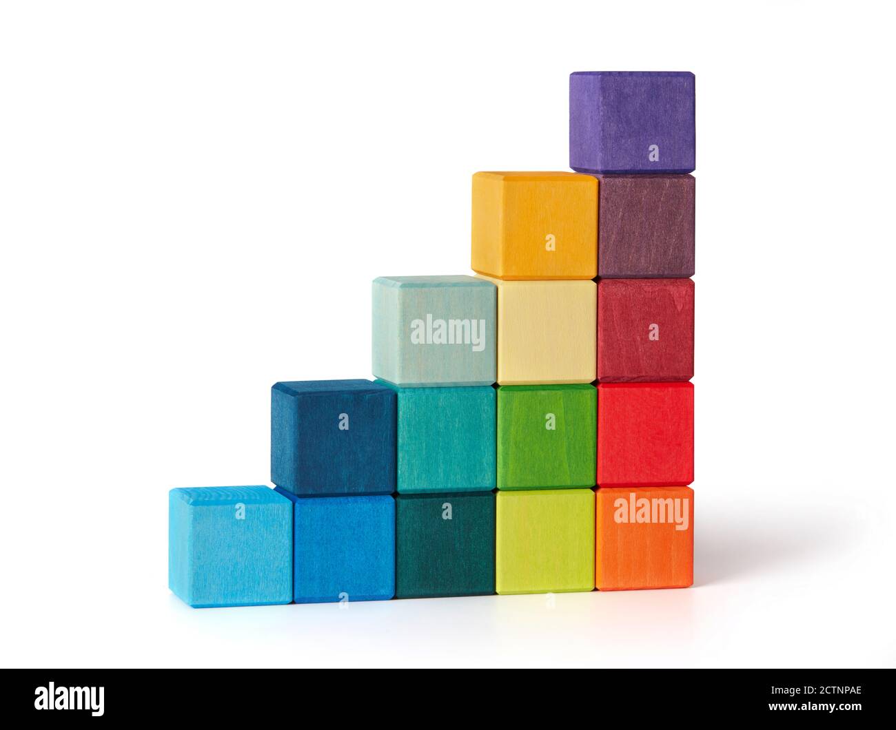 Wooden toy blocks on white background Stock Photo - Alamy