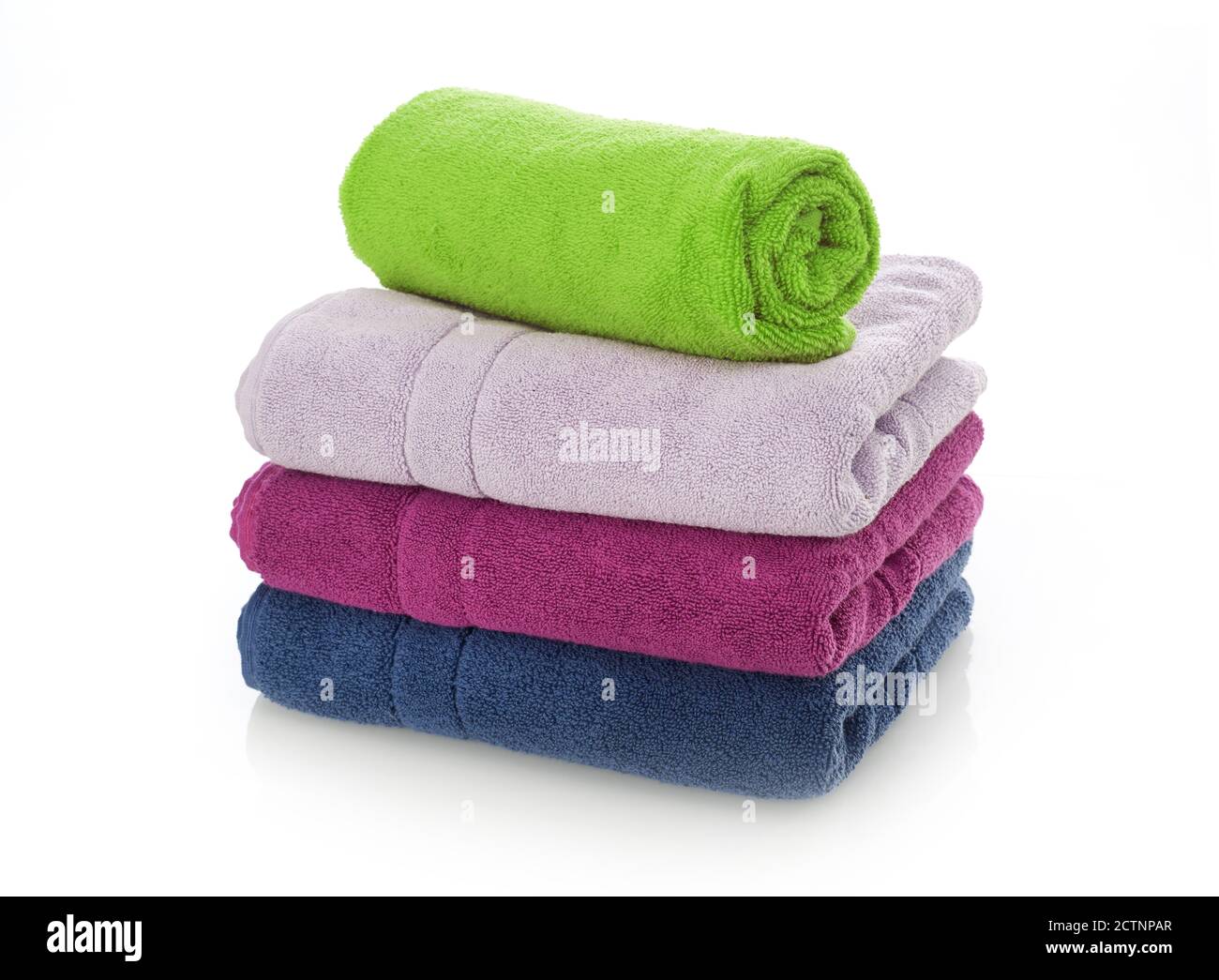 Clean multi-colored towels isolated on white Stock Photo - Alamy
