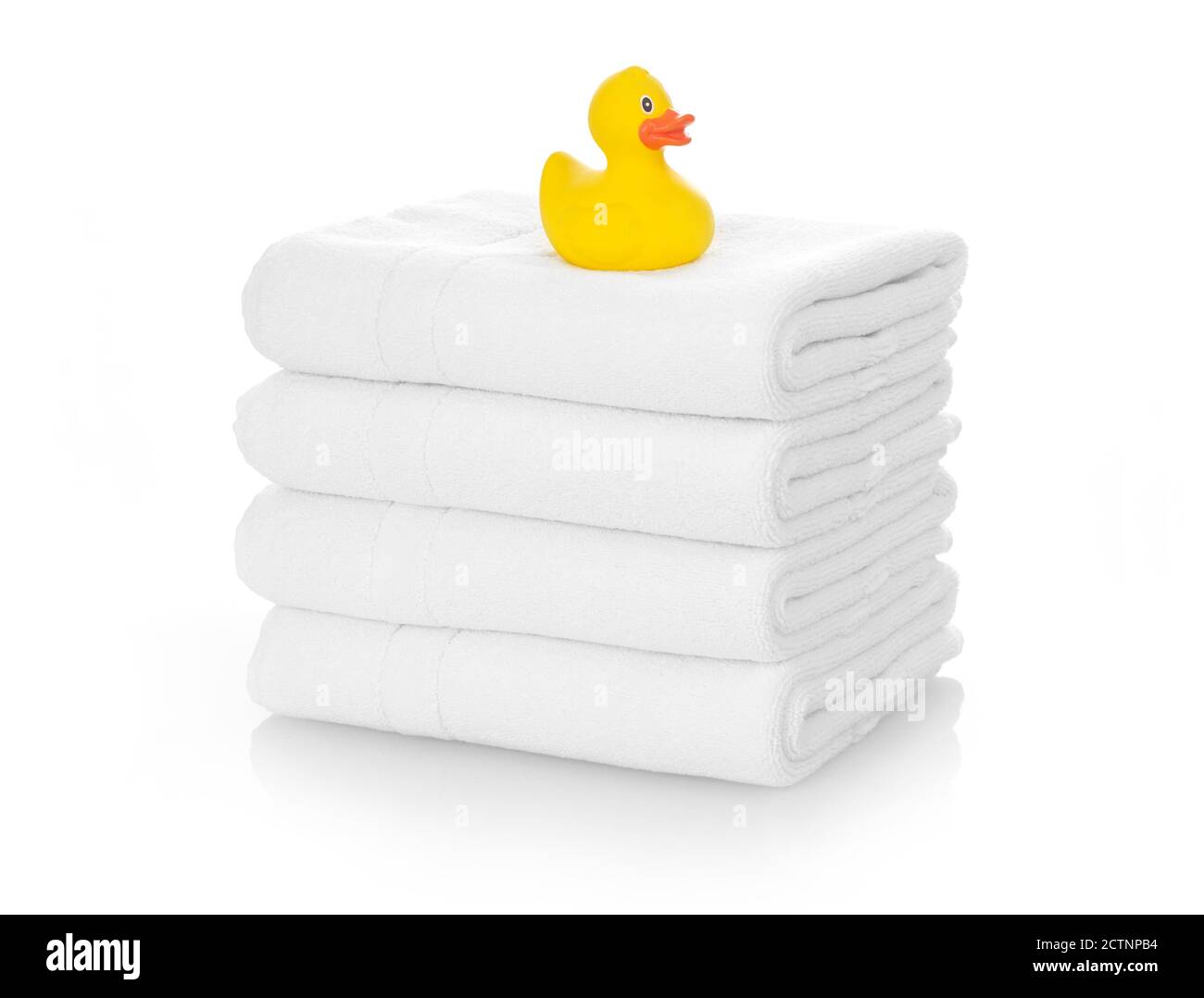Rubber duck on white towels, isolated on white Stock Photo - Alamy