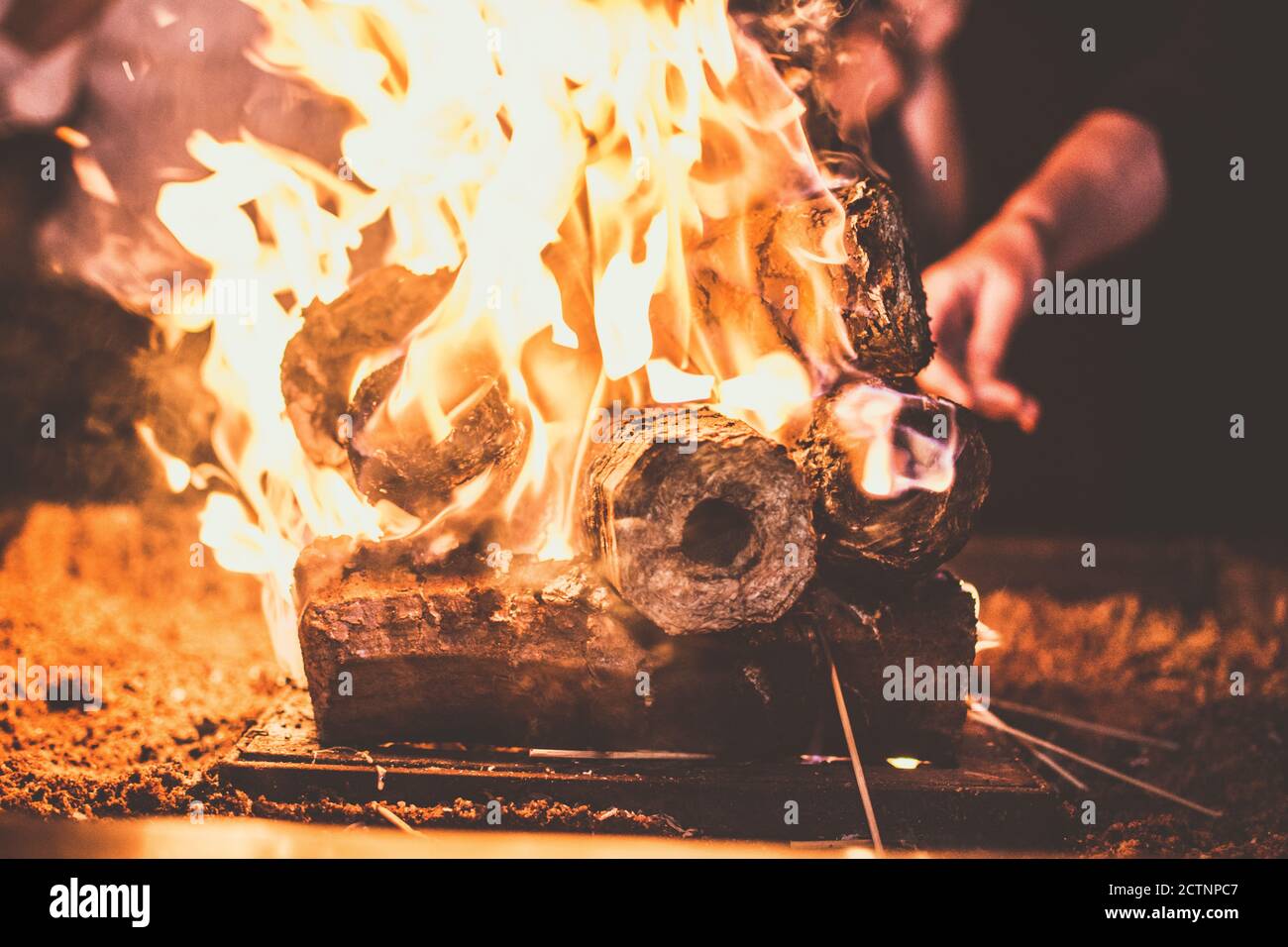 Fire pit at an outdoor wedding reception in Norfolk Stock Photo - Alamy