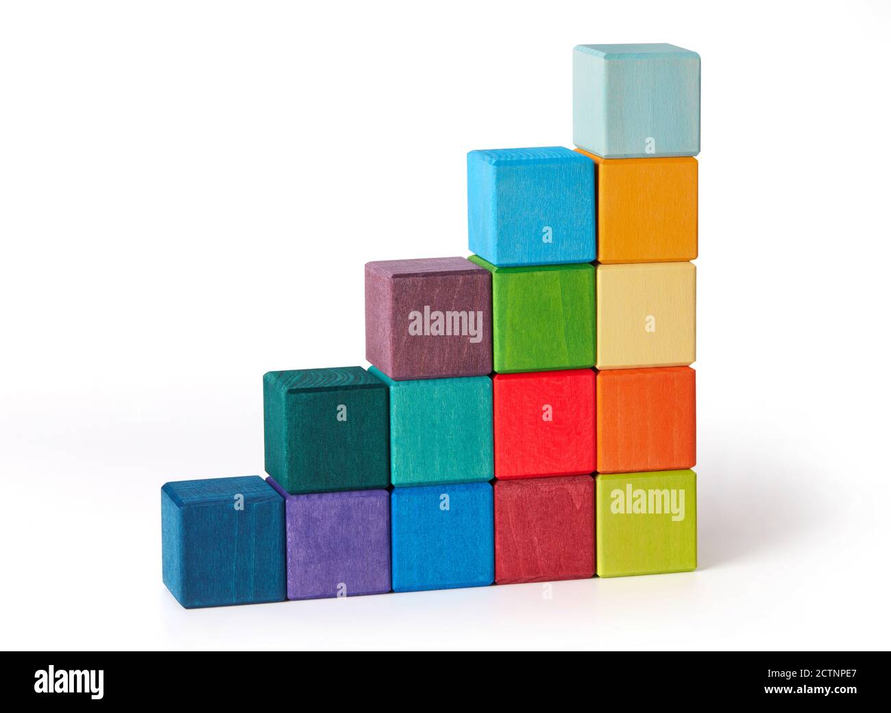 Wooden toy blocks on white background Stock Photo - Alamy