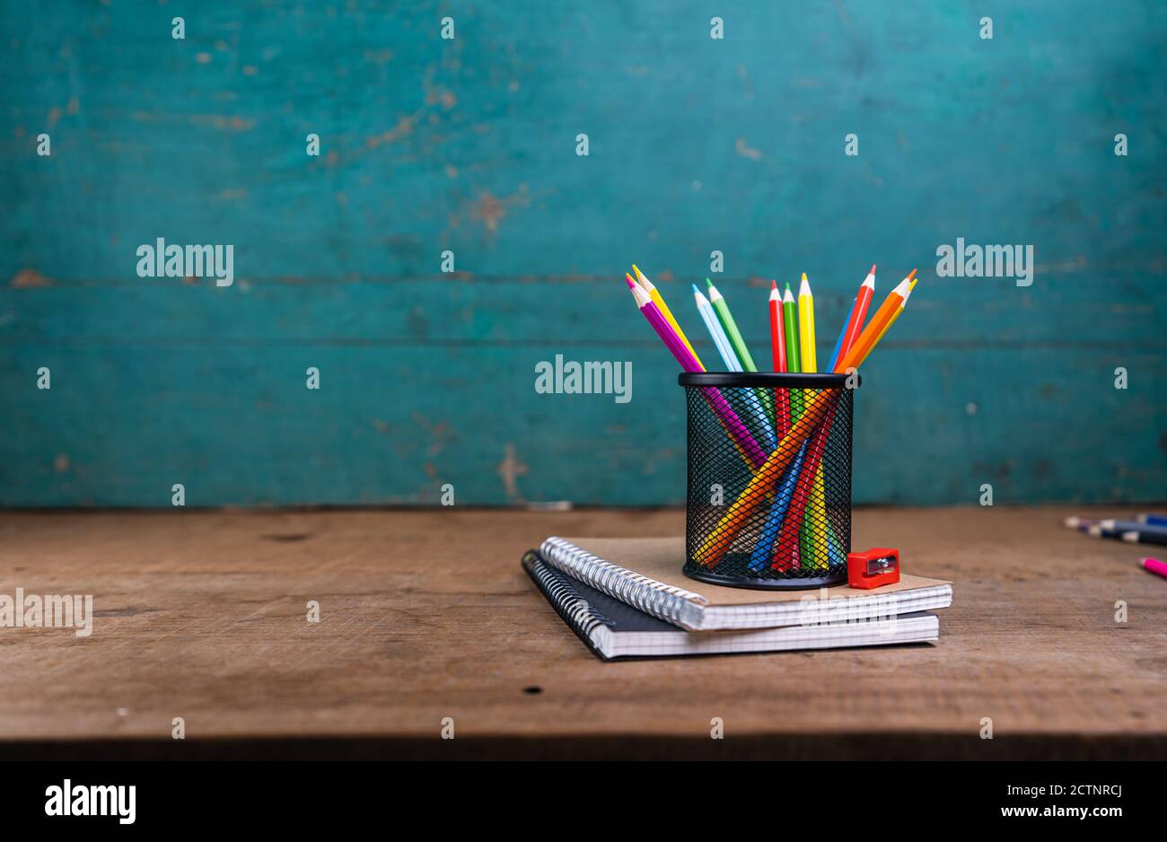 School desk Wood color on wooden table background board Stock Photo - Alamy