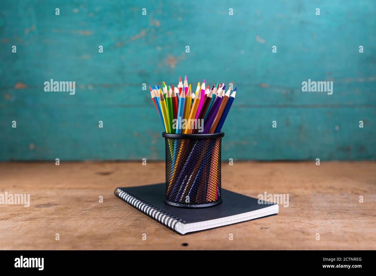 School desk Wood color on wooden table background board Stock Photo - Alamy