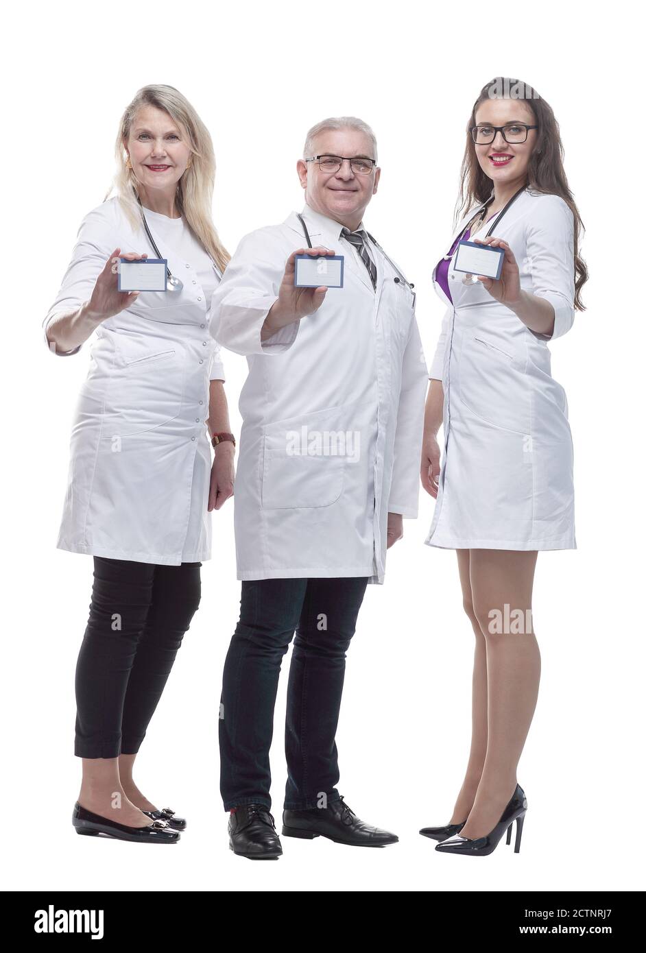 in full growth. a group of qualified doctors showing their visiting ...