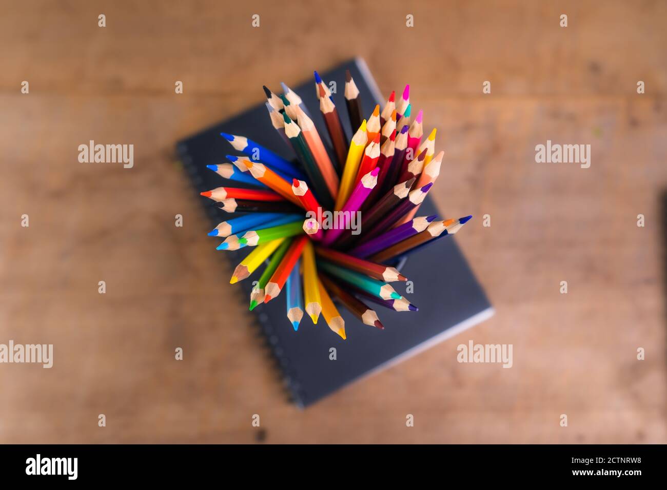 School desk Wood color on wooden table background board Stock Photo - Alamy