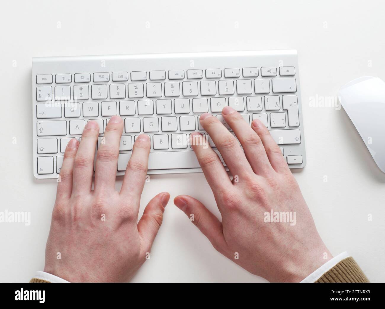 Typing on keyboard Stock Photo - Alamy