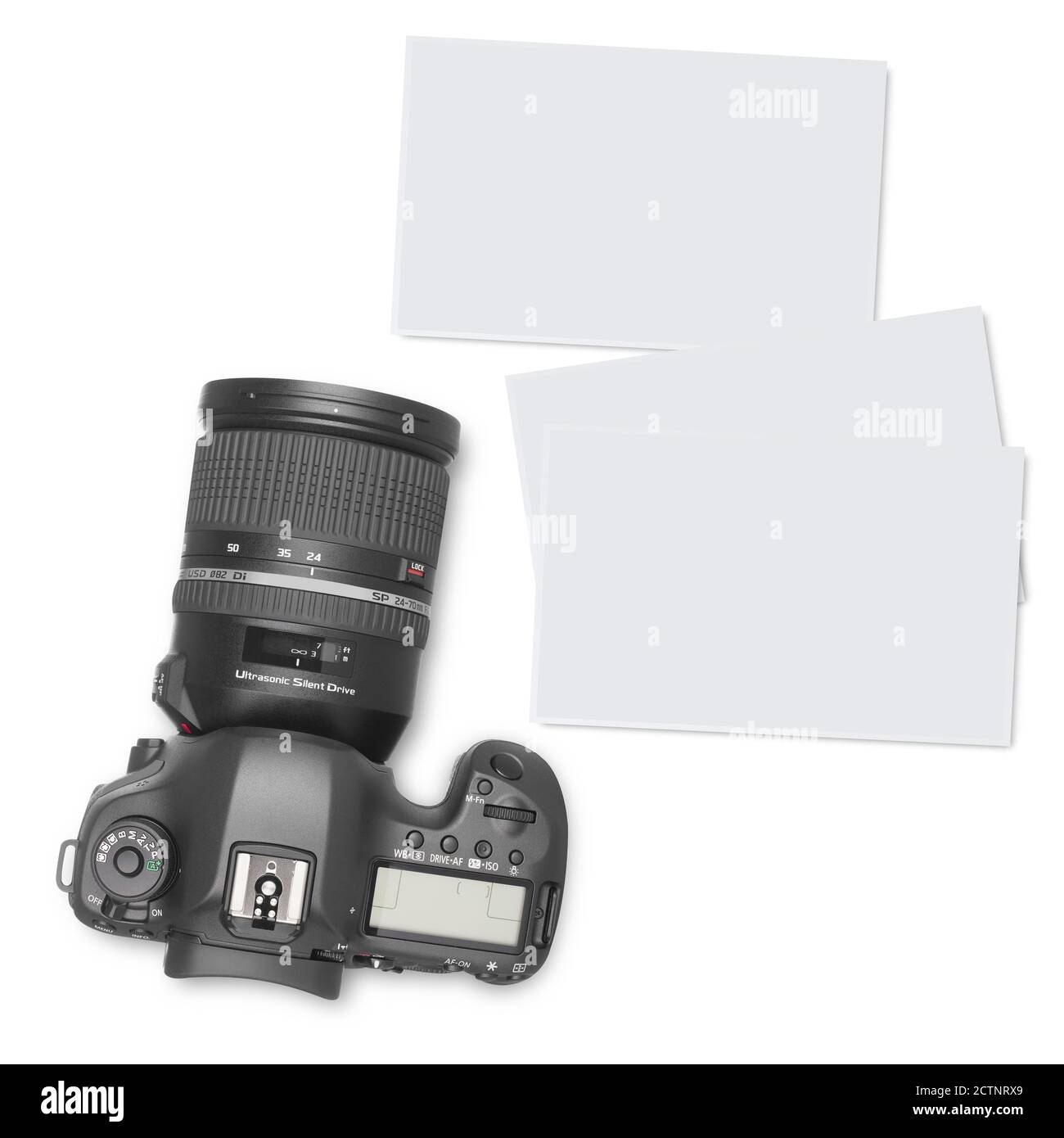 Modern camera and blank photo frames isolated on white Stock Photo - Alamy